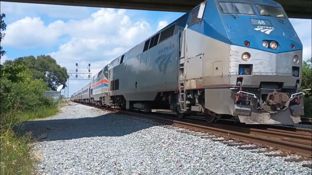 AMTRAK P091 SILVER STAR WITH AMTRAK 130 PHASE ll HERITAGE UNIT @ UNDER MAIN ST BRIDGE AUBURNDALE ...