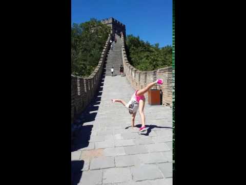 Luna Noor cartwheels on the Great Chinese Wall