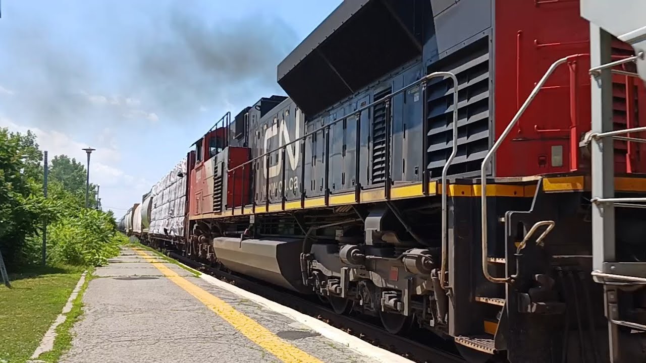 CPKC 133 and CN M322 with a SMOKEY SD70M-2 mid-DPU! - Gare Dorval, Qc # ...