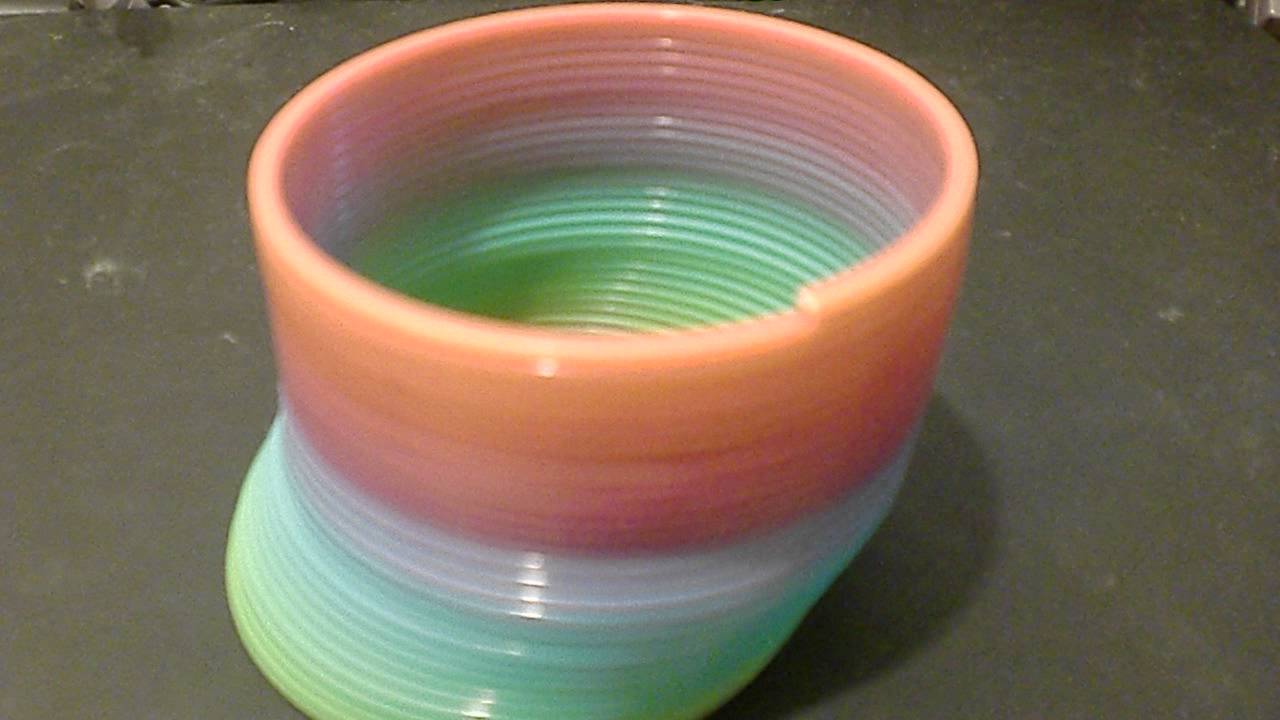 unboxing plastic rainbow magic spring toy - YouTube