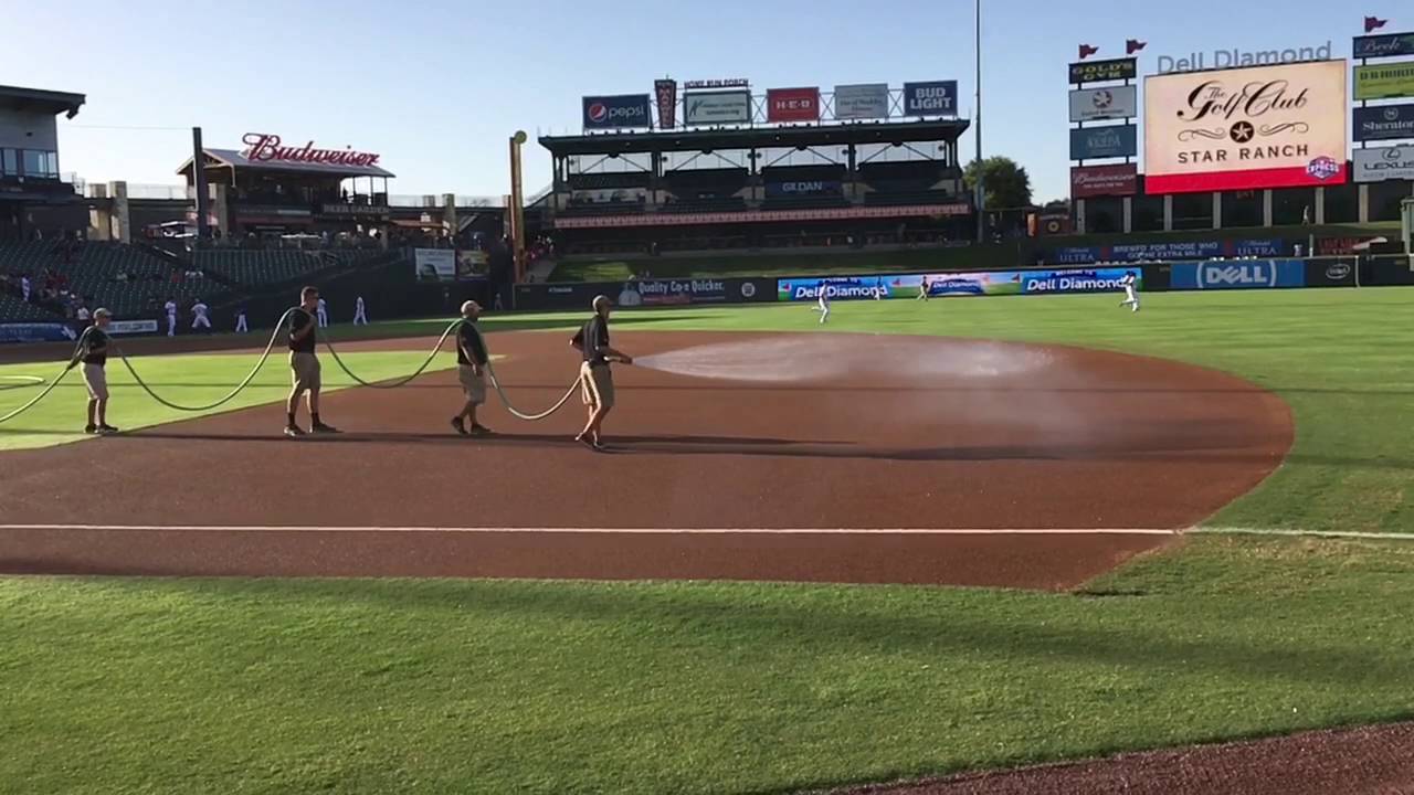 Baseball grounds crew watering infield - HD slow motion - Stock footage ...