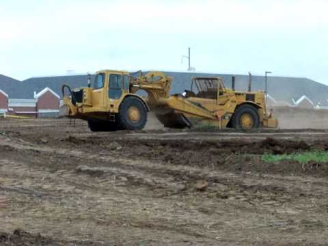 Cat 627F/G Scrapers Working - YouTube