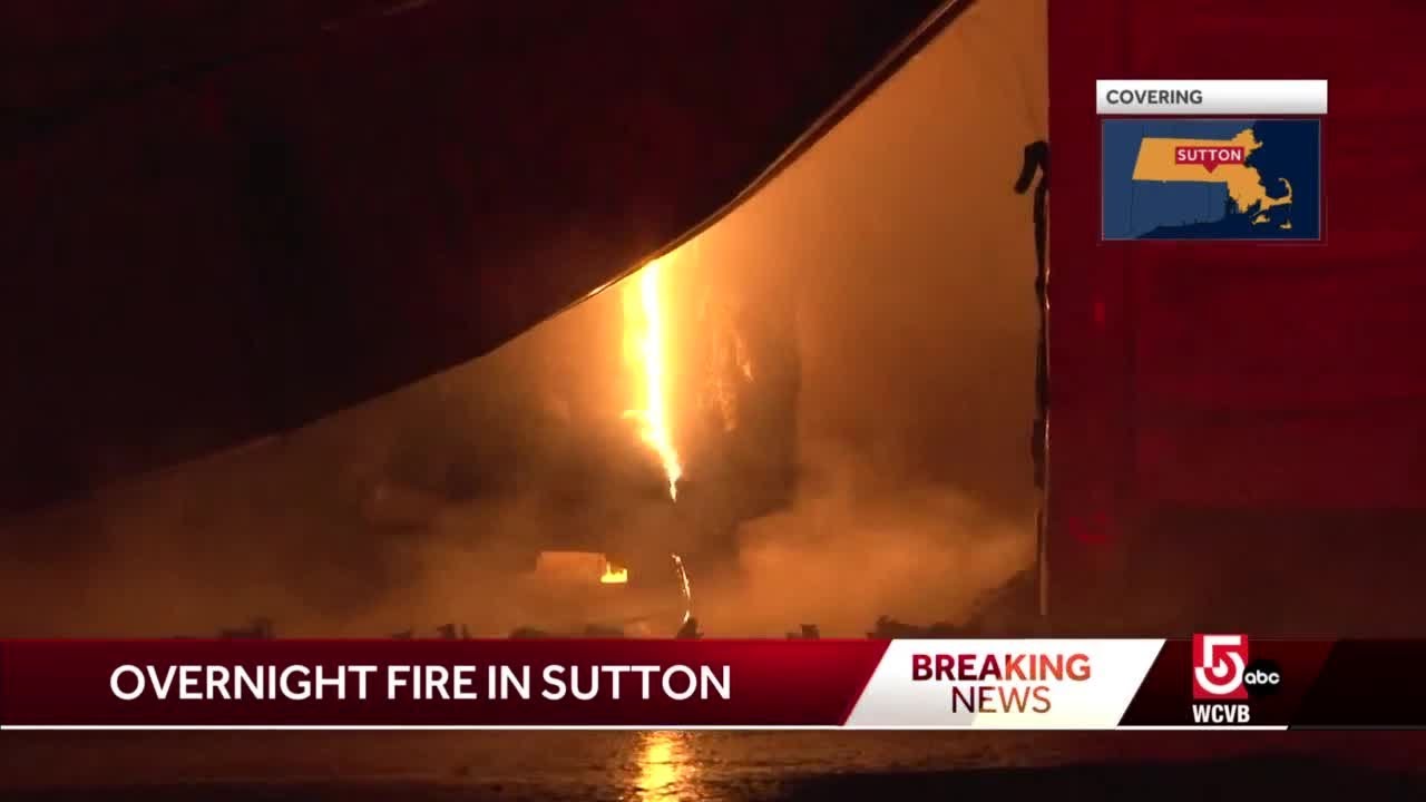 Fire rips through garage at Sutton home - YouTube