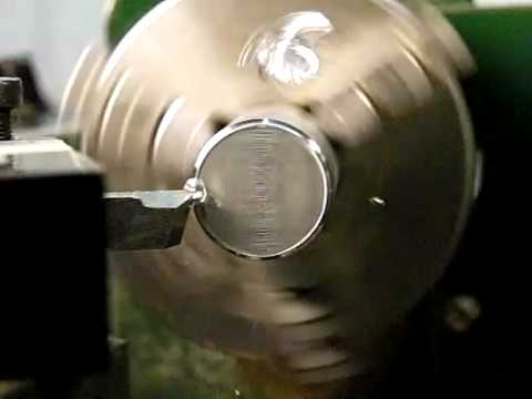Turning Aluminum on a lathe 300fps - YouTube
