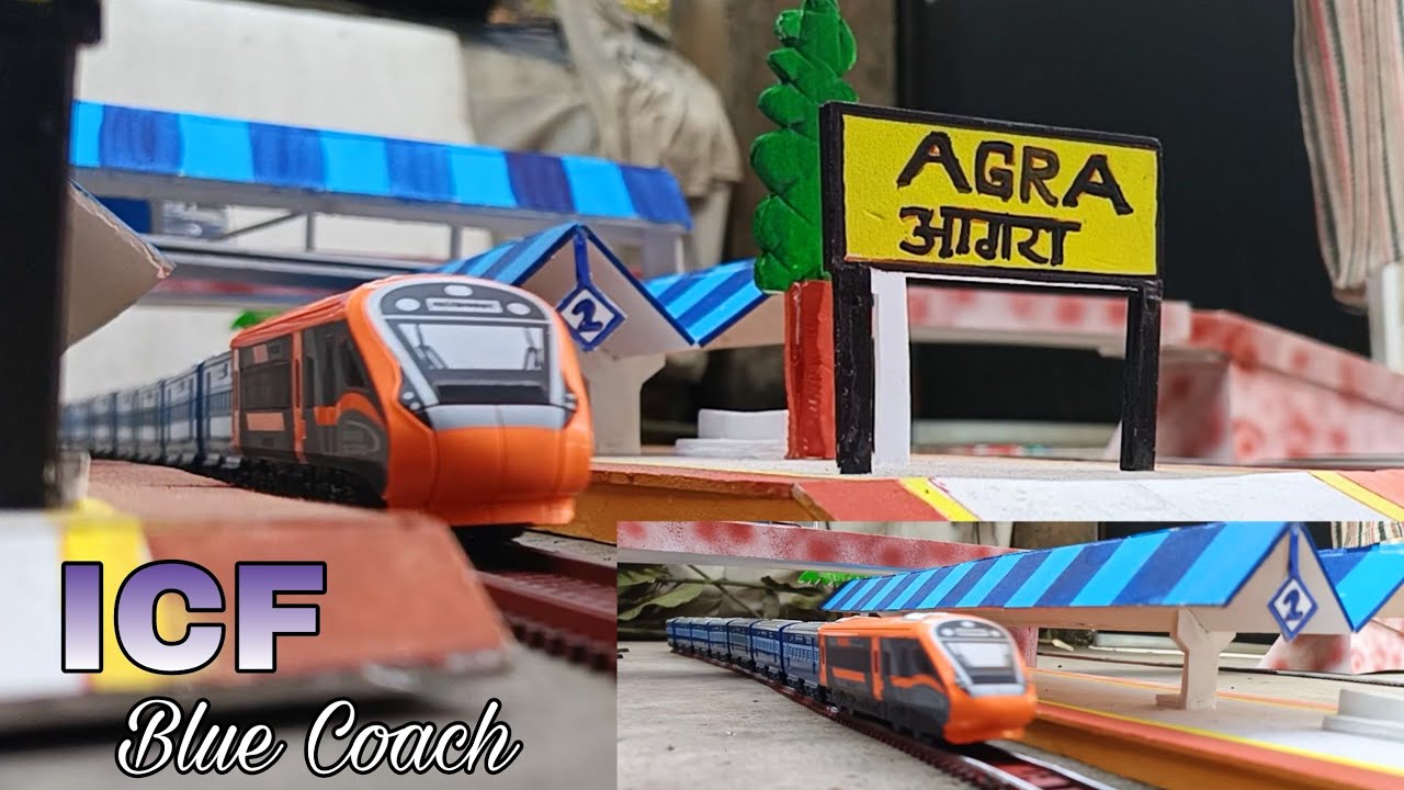 ICF Blue Toy train hauled by Vande Bharat locomotive crossing miniature ...