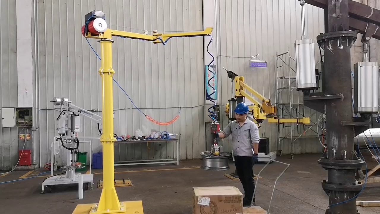 Folding arm manipulator handles the wheel hub - YouTube