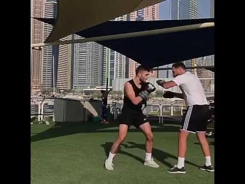 Dubai boxing coach padwork and punch paddle work with young boxer at ...