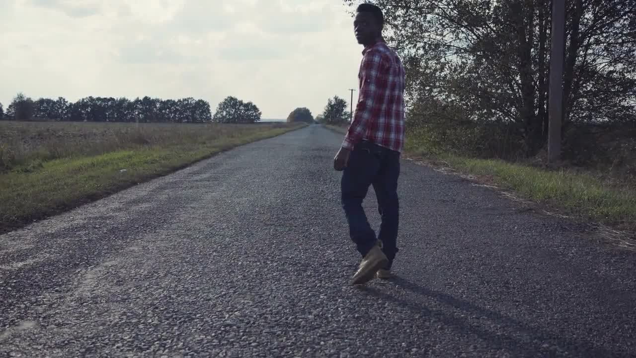 Man Walking Alone On A Road Stock Video - YouTube