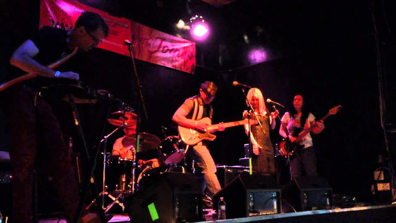 Dr Dan playing guitar with teeth with Randy Guss from Toad The Wet ...