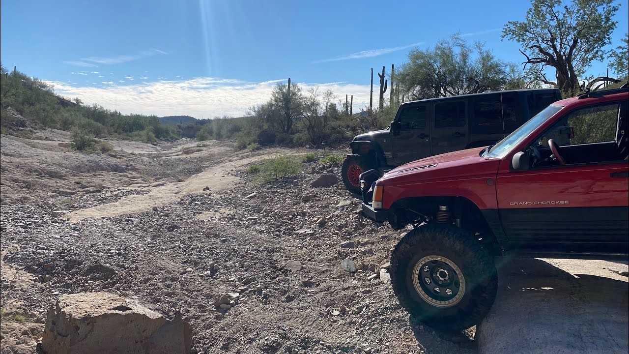 Rock crawling in a lifted 5 speed grand Cherokee zj on 38s on rough country long arms?! 😮😮 - YouTube