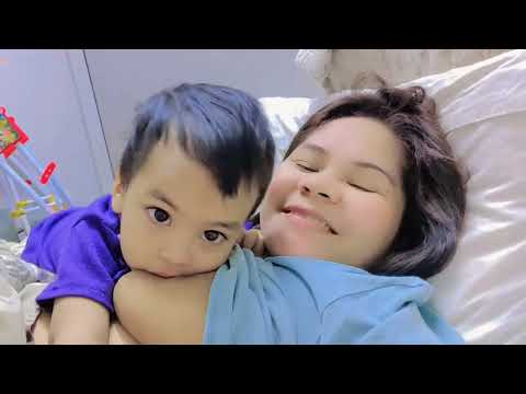 BREASTFEEDING BABY BY BEAUTIFUL MOTHER.