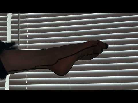 Sensualy putting on Nylons