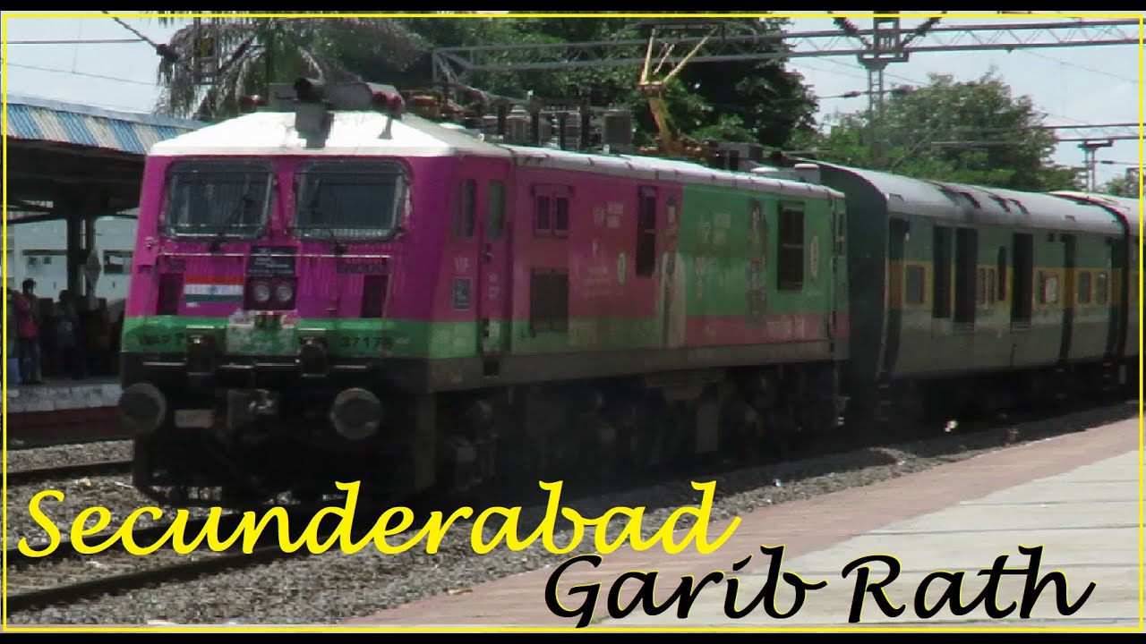 Honking High Speed Garib Rath Express Cruising through a Railway ...