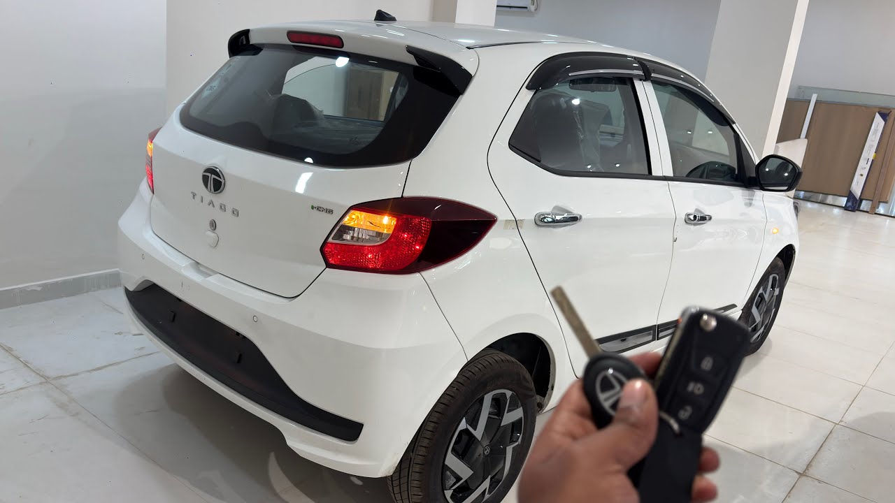 Tata Tiago XM Updated GST Price 2025 Tiago XM Base Model Mileage ...