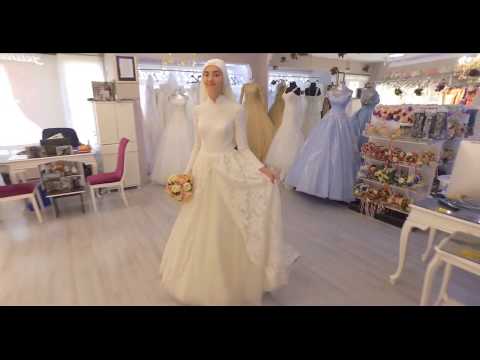 ödüllü, kapalı, tesettürlü , eteği ve bedeni ful fransız dantelli, hakim yaka gelinlik modeli