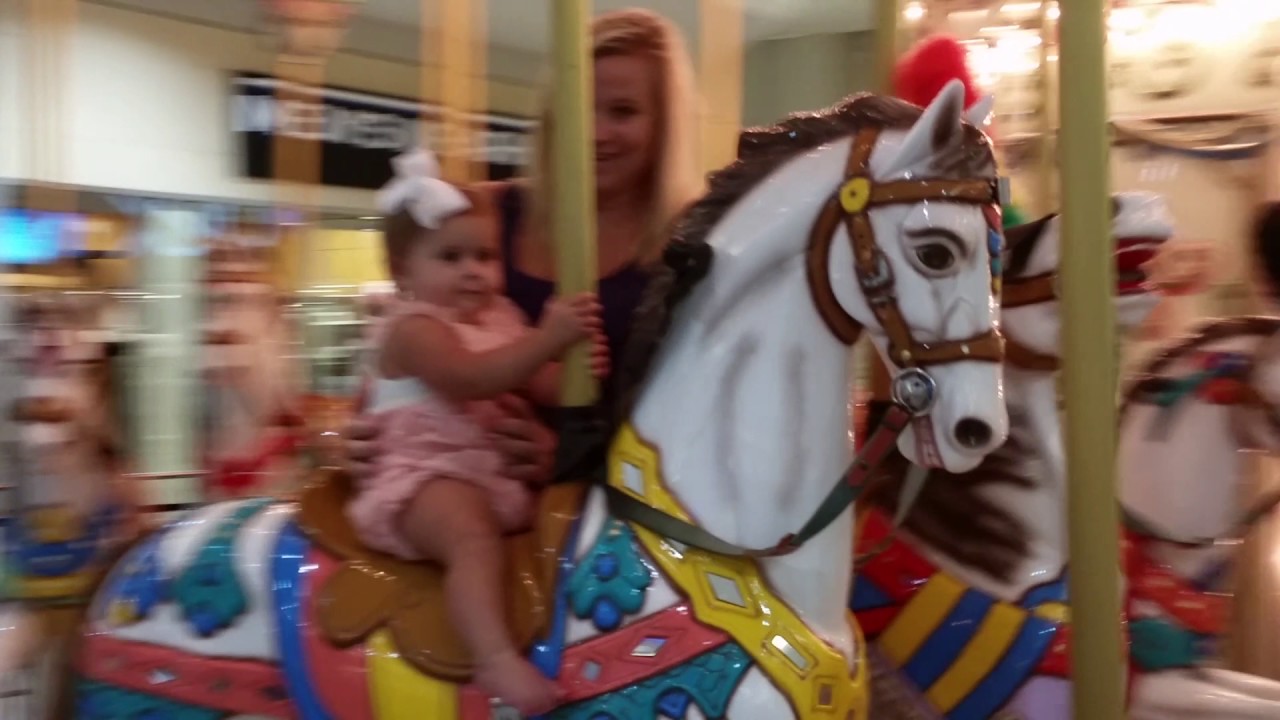 HK and mommy on carousel - YouTube