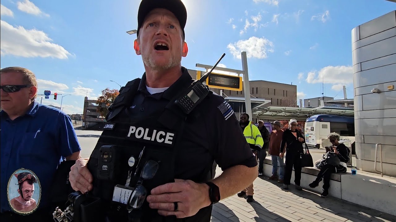 unidentified police officer plays to the peanut gallery before ...