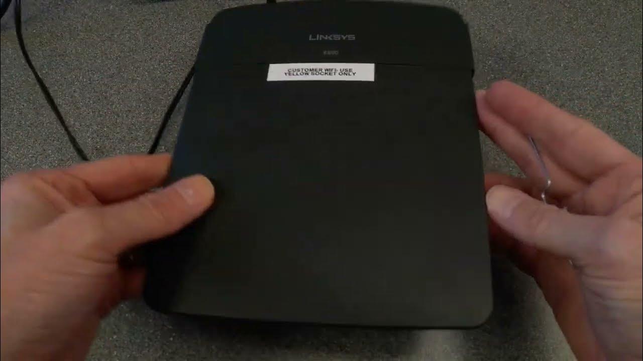 How to factory reset a Linksys E900 WiFi Router - YouTube