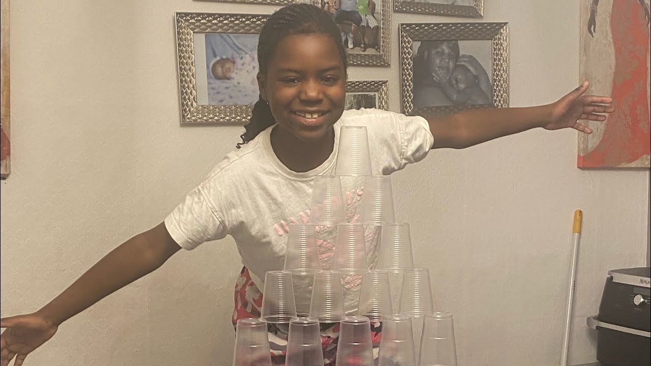 Building a plastic cup pyramid - YouTube