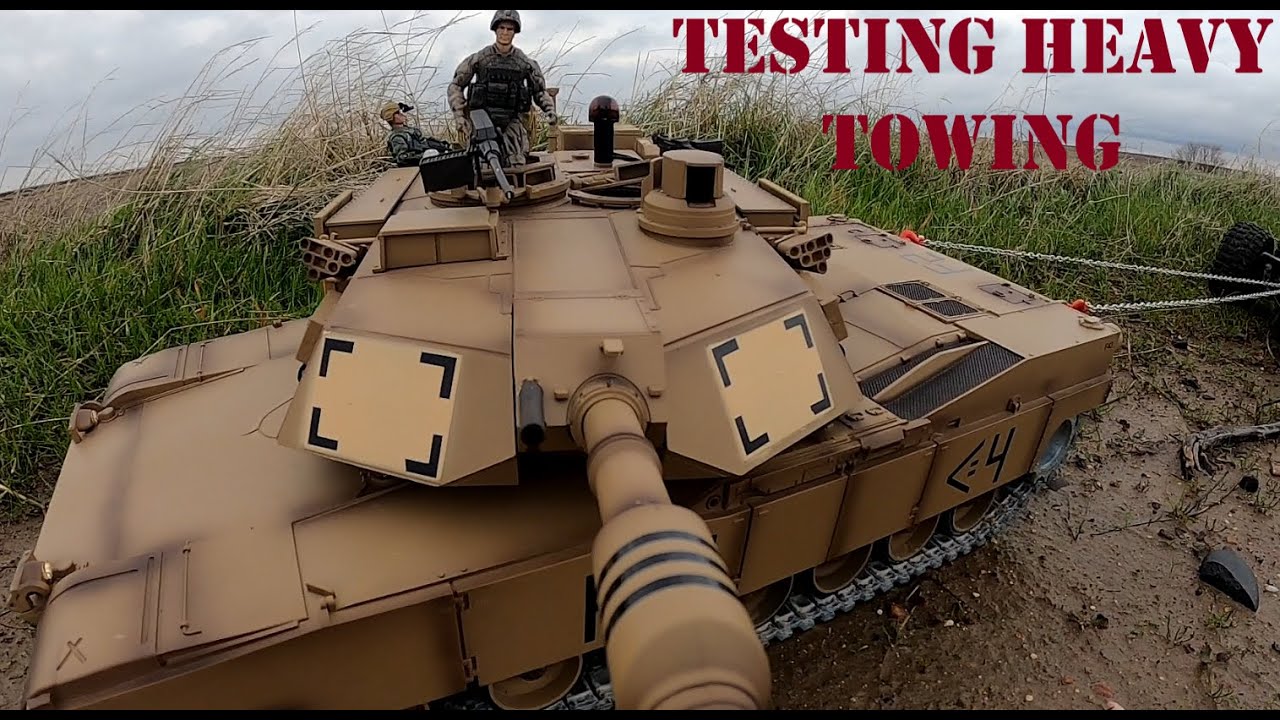 US Army Abrams M1A2 towing in heavy conditions & Fired from the barrel ...