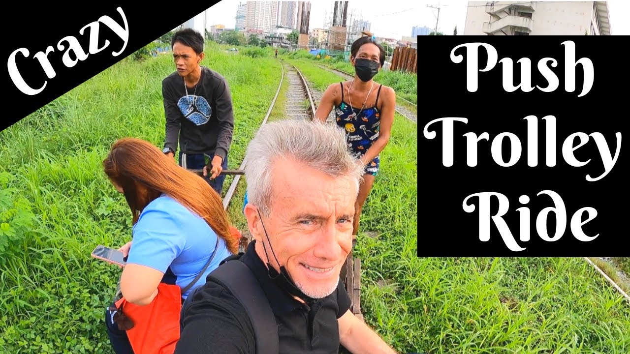 CRAZY PUSH TROLLEY RIDE on Train Tracks in Manila. - YouTube