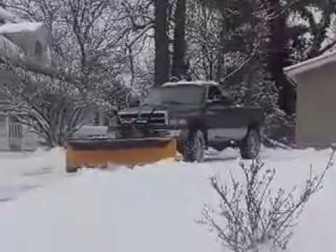 Snow plowing slick driveway 2014 - YouTube