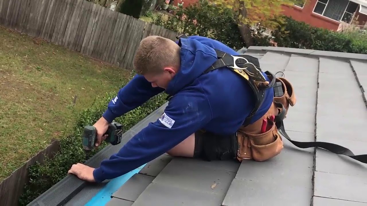 Actual roof repairs and installation of roof leaf guard and valley ...