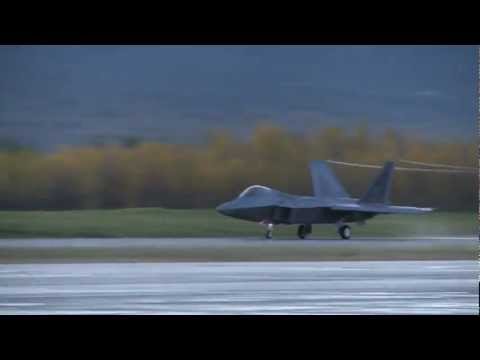 F 22 Raptor Jet Fighter Aircraft Take Off from USAF Air Base an F22 Plane Taking Off in the Rain ...