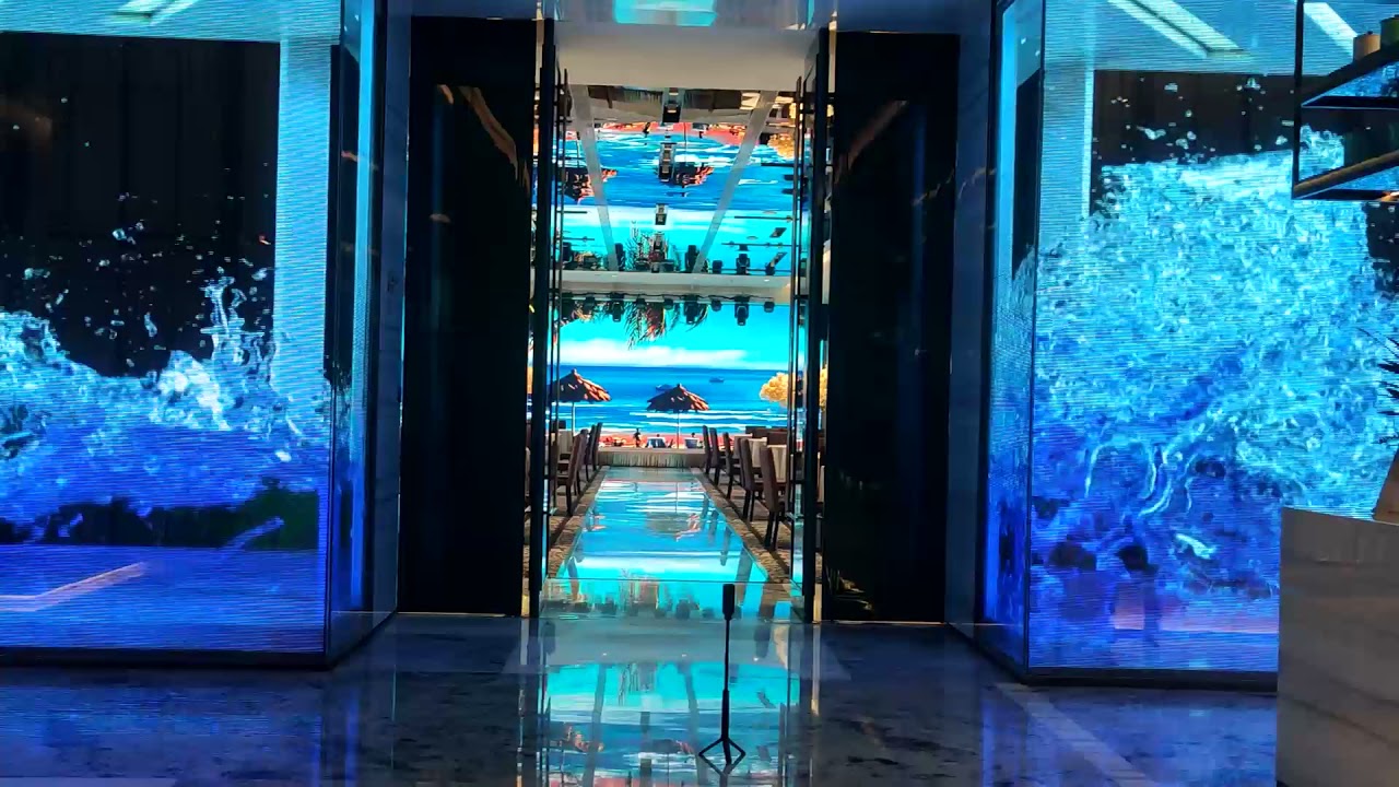 Transparent LED display applied in restaurant - YouTube