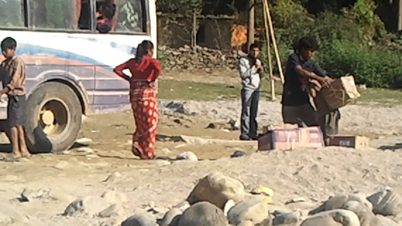 small boy carrying a heavy load - YouTube