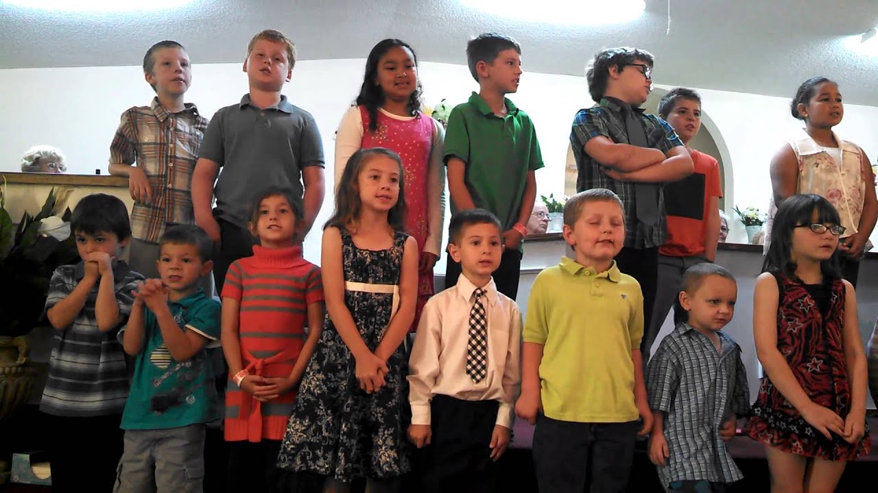 Children's choir sings Sunday morning in church - YouTube