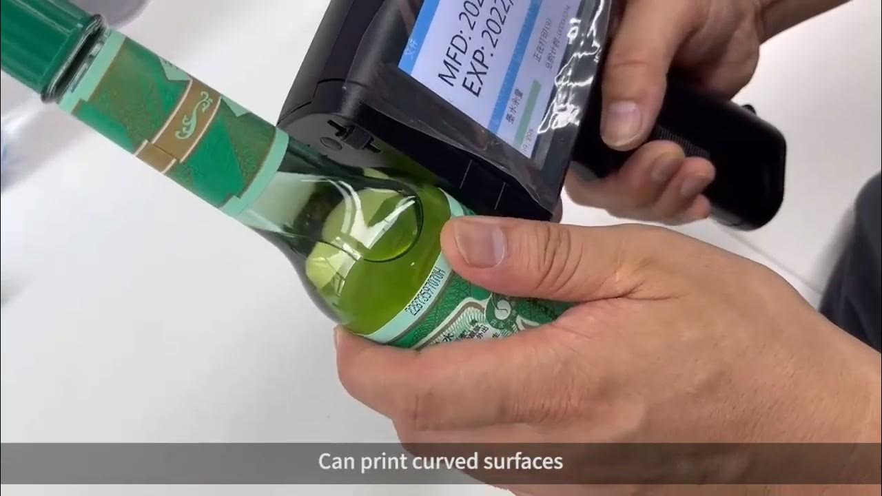 Affordable touch screen MRP printing machine for bottles - YouTube