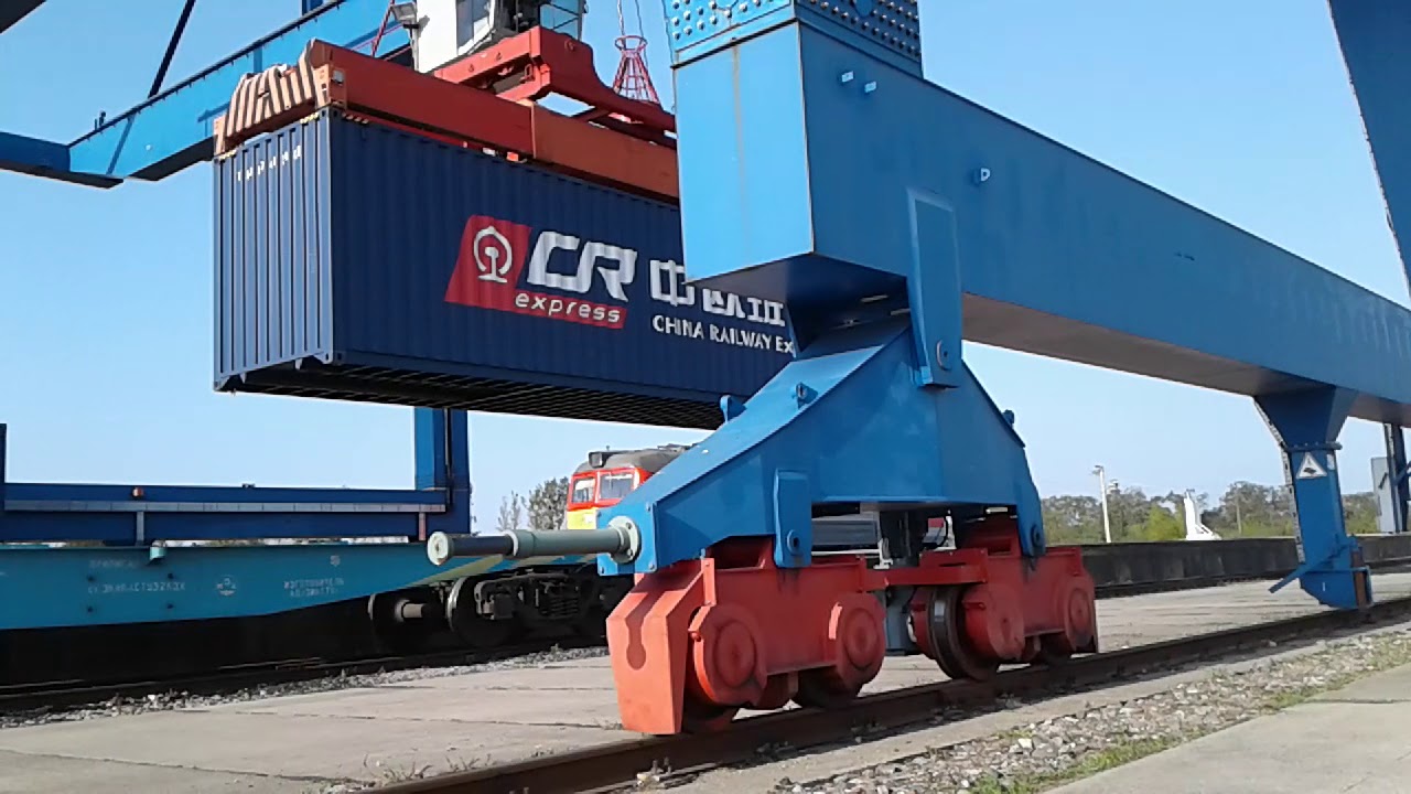 Transhipment of containers from the European to the Russian train - YouTube
