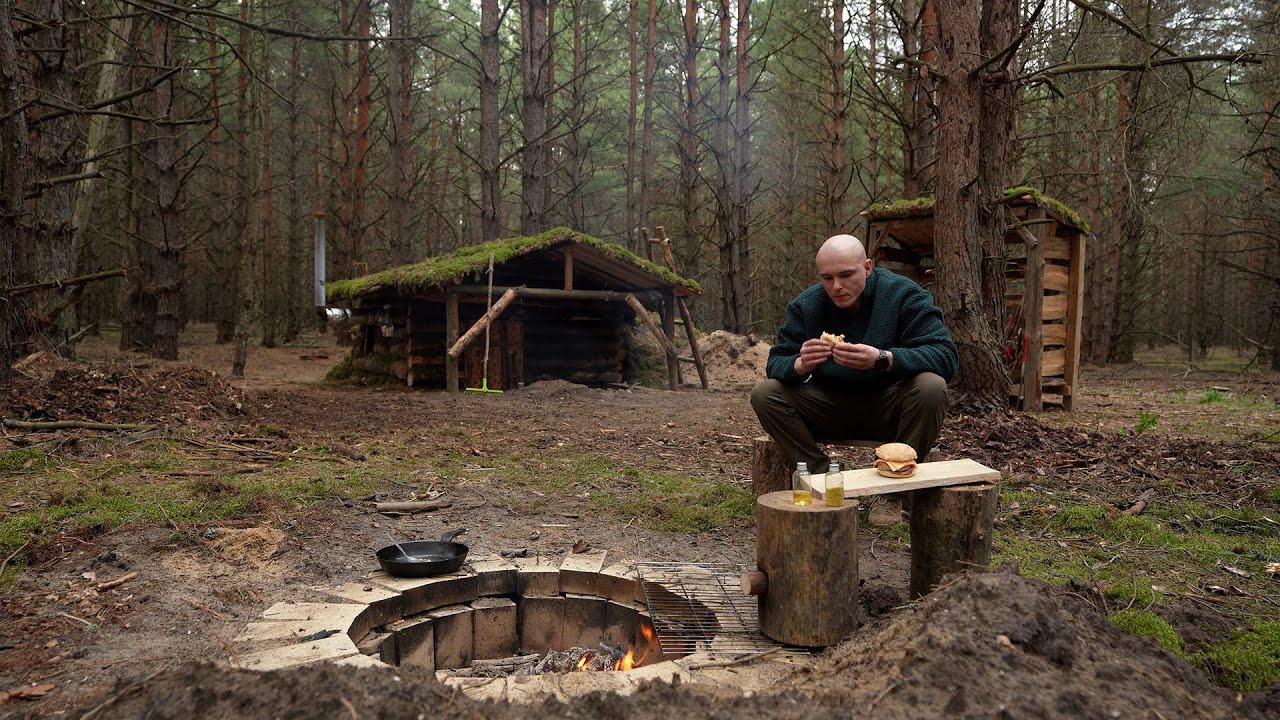 My Dugout shelter in the woods, log shelter building, modern bushcraft ...