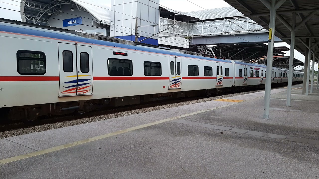 KTM Class 92 EMU Arriving And Departing Nilai - YouTube