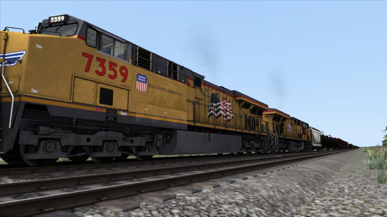 UP 7359 leads UP mixed freight train on TSC - YouTube