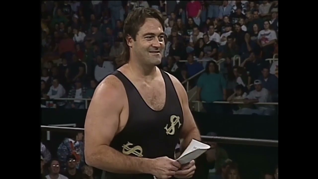 Ted DiBiase hands his old WWF Tag Team Partner - Mr. Wallstreet (I.R.S ...