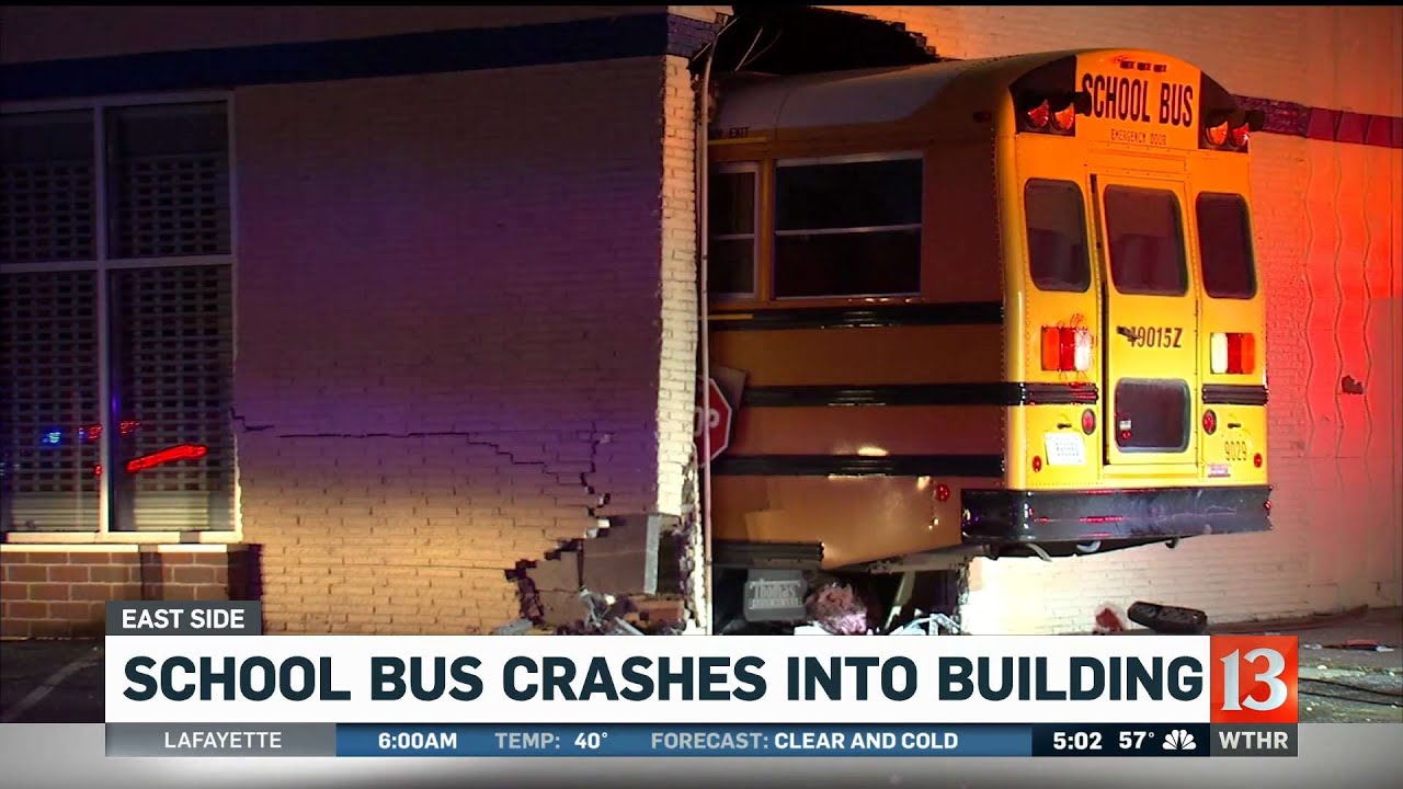 School bus crashes into building - YouTube