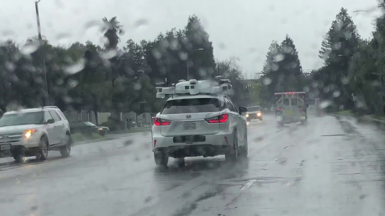 Apple autonomous car driving in rain - YouTube