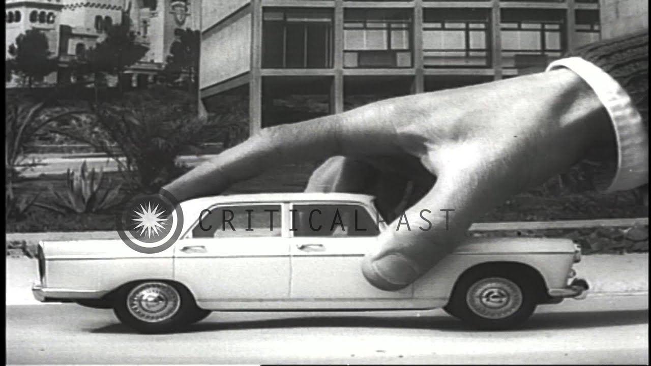 A cameraman performs camera tricks and uses miniatures to show the ...