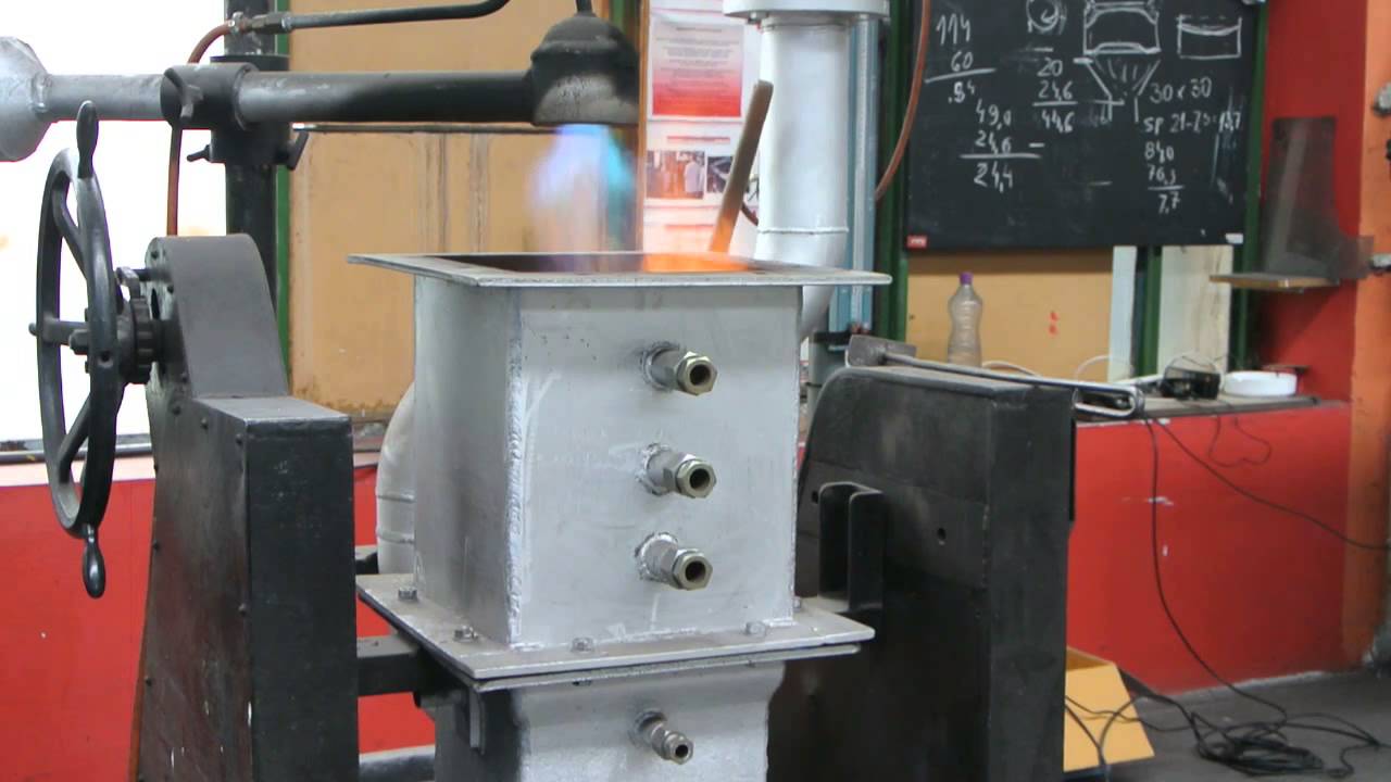 Iron ore sintering with biomass - start of heating of sinter pot ...