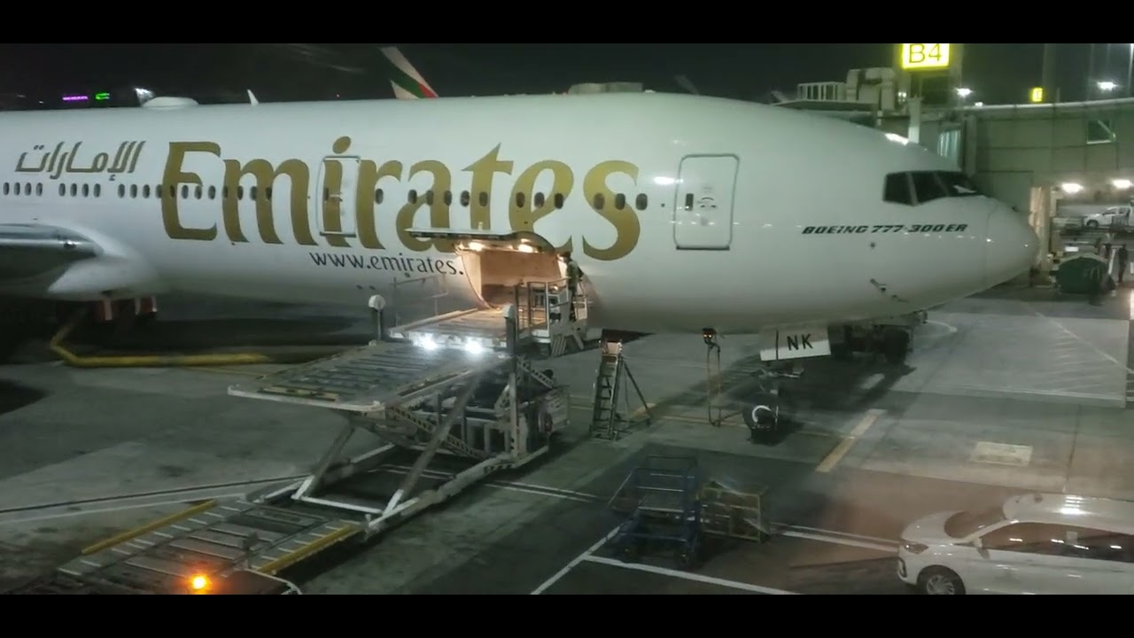 OFFLOADING OF GOODS FROM FLY EMIRATES USING ROLLER BED SYSTEM AND UNIT ...