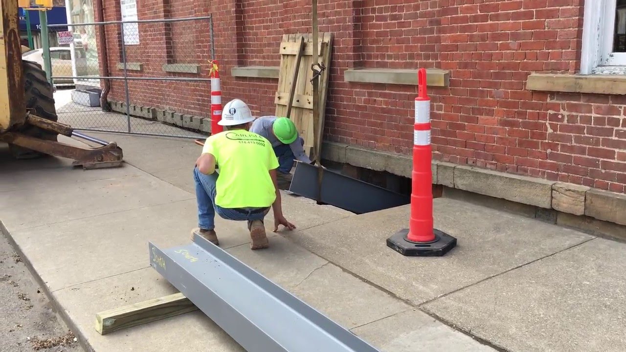 Lowering Steel I-Beam Into the Basement - 3 of 4 - YouTube
