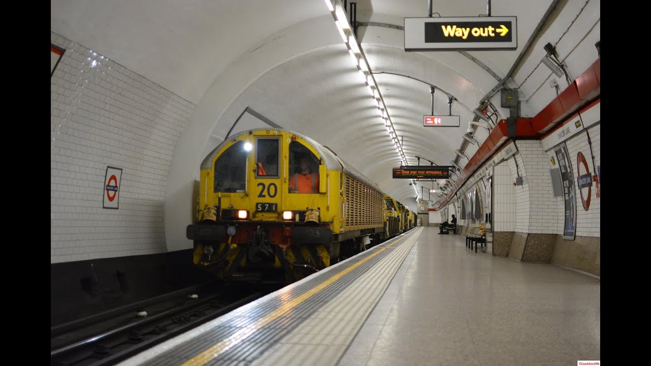 London Underground Battery Locomotives L20 and L18 hauling Tamper ...
