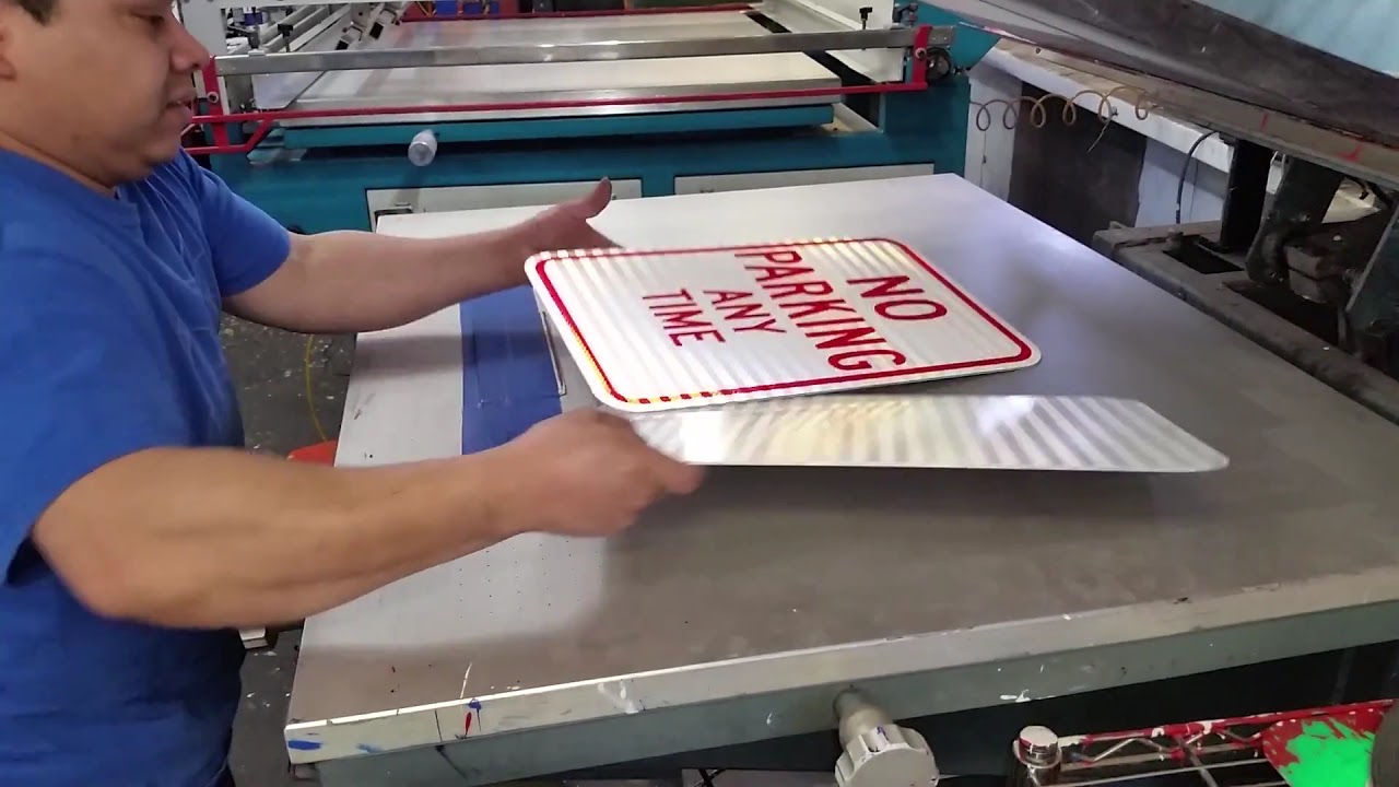Silk screening NO PARKING signs on aluminum - YouTube