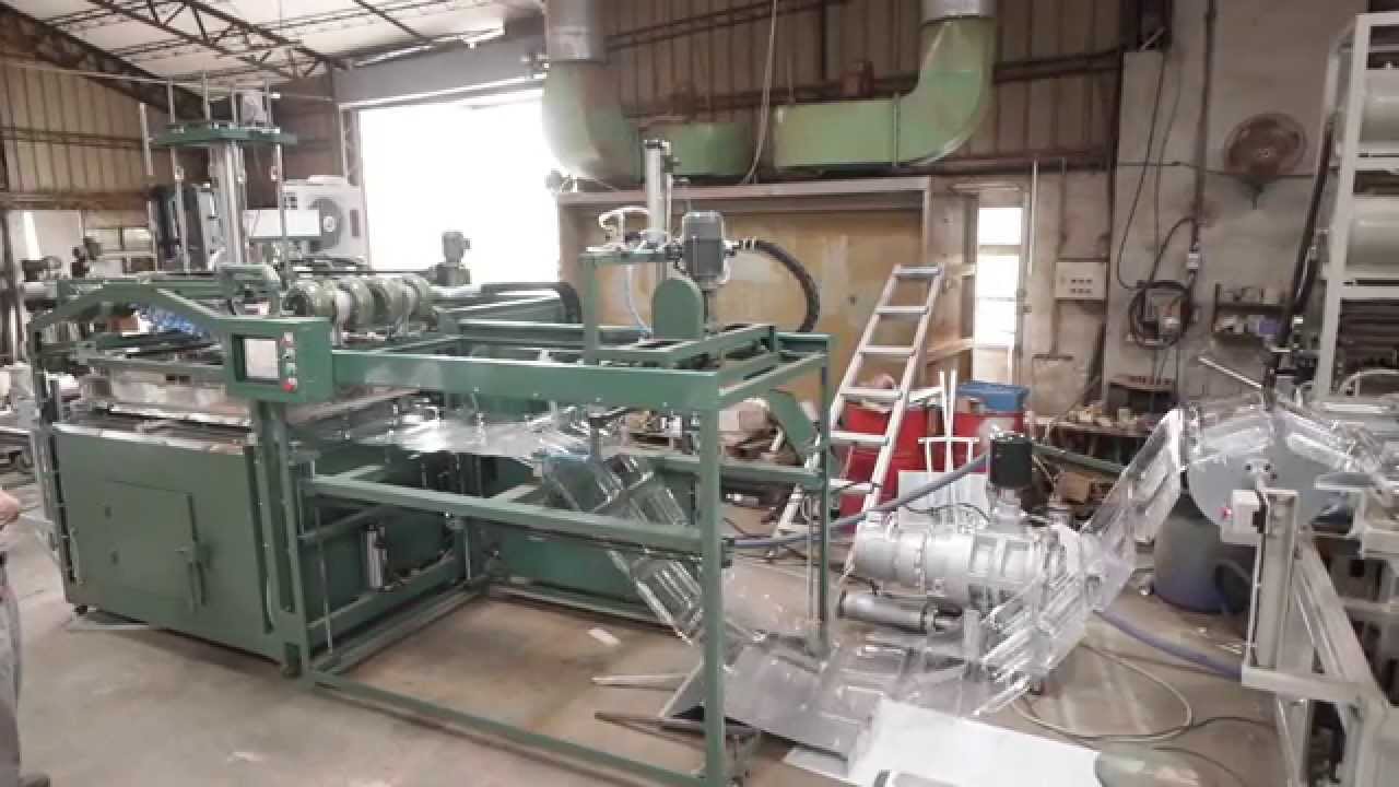 Vacuum forming production line - YouTube