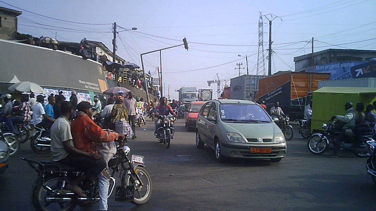 Ndokoti in the morning Douala: taxis, bendskins, embouteillage - YouTube