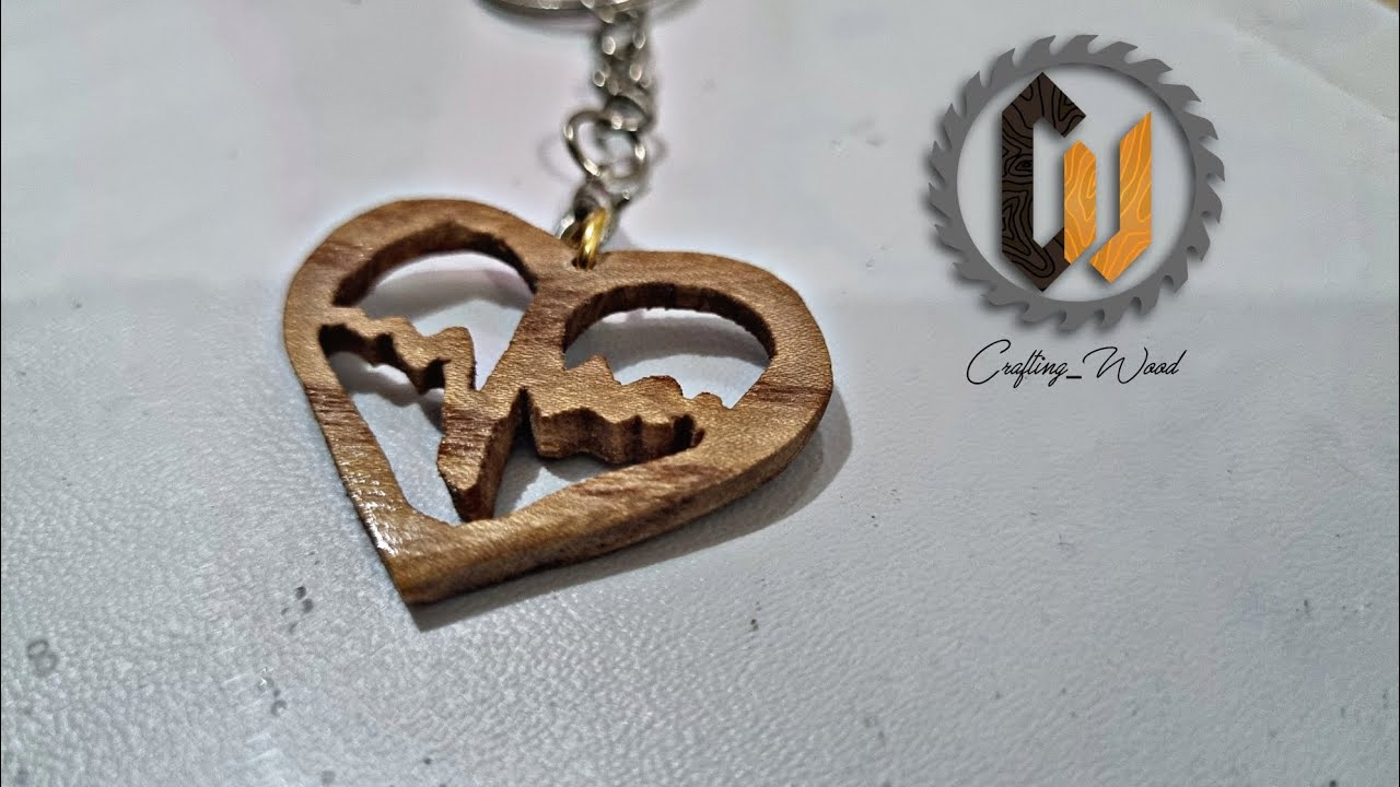 making and woodworking and woodcraving wooden keychain (beating heart ...