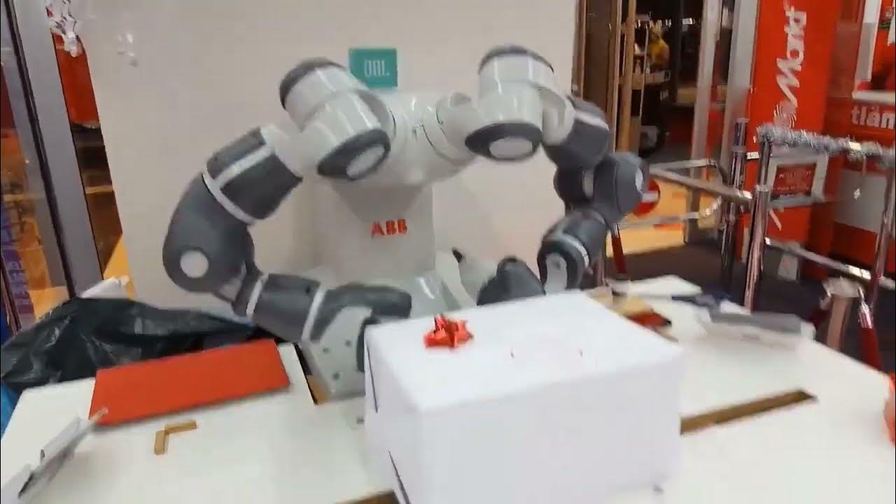 YuMi Collaborative Robot From ABB Wrapping A Gift - YouTube