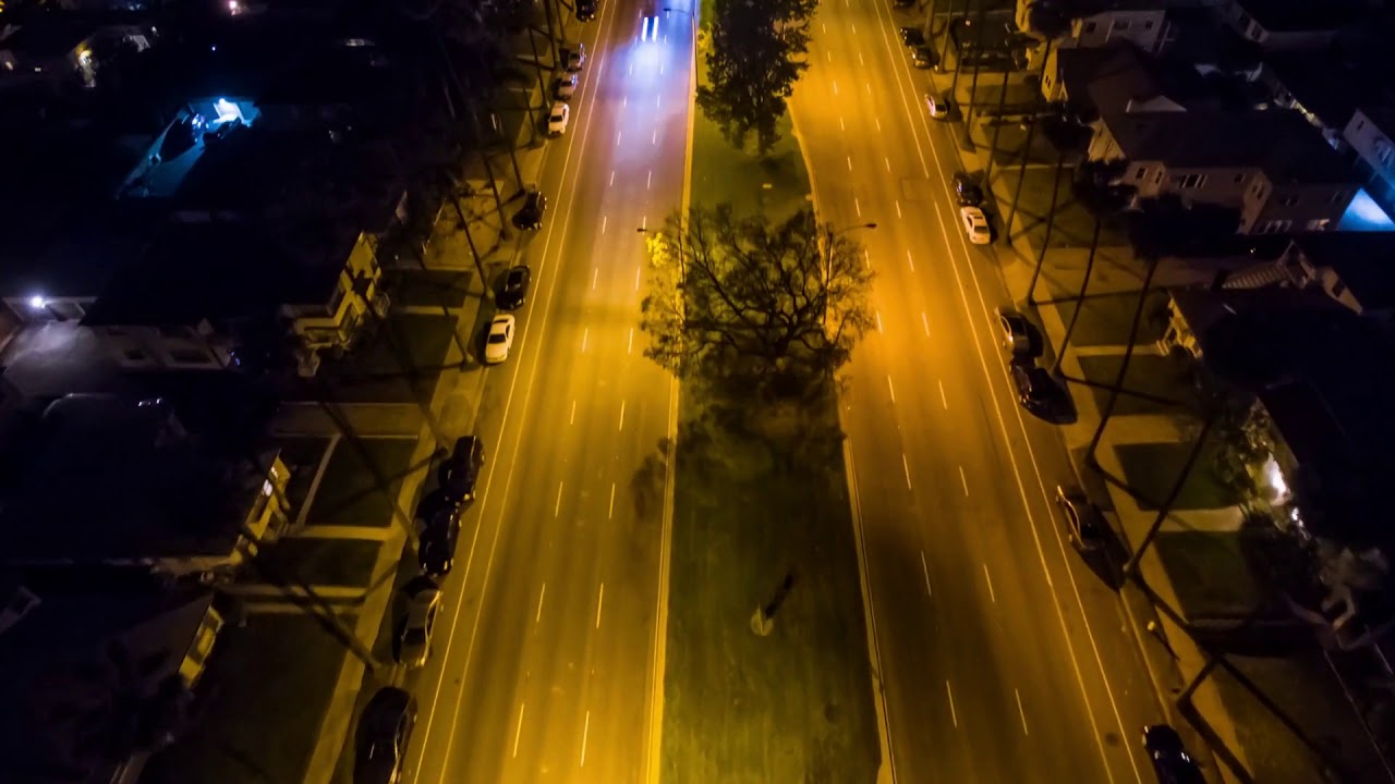 aerial timelapse in motion hyperlapse at night with a cinematic look ...